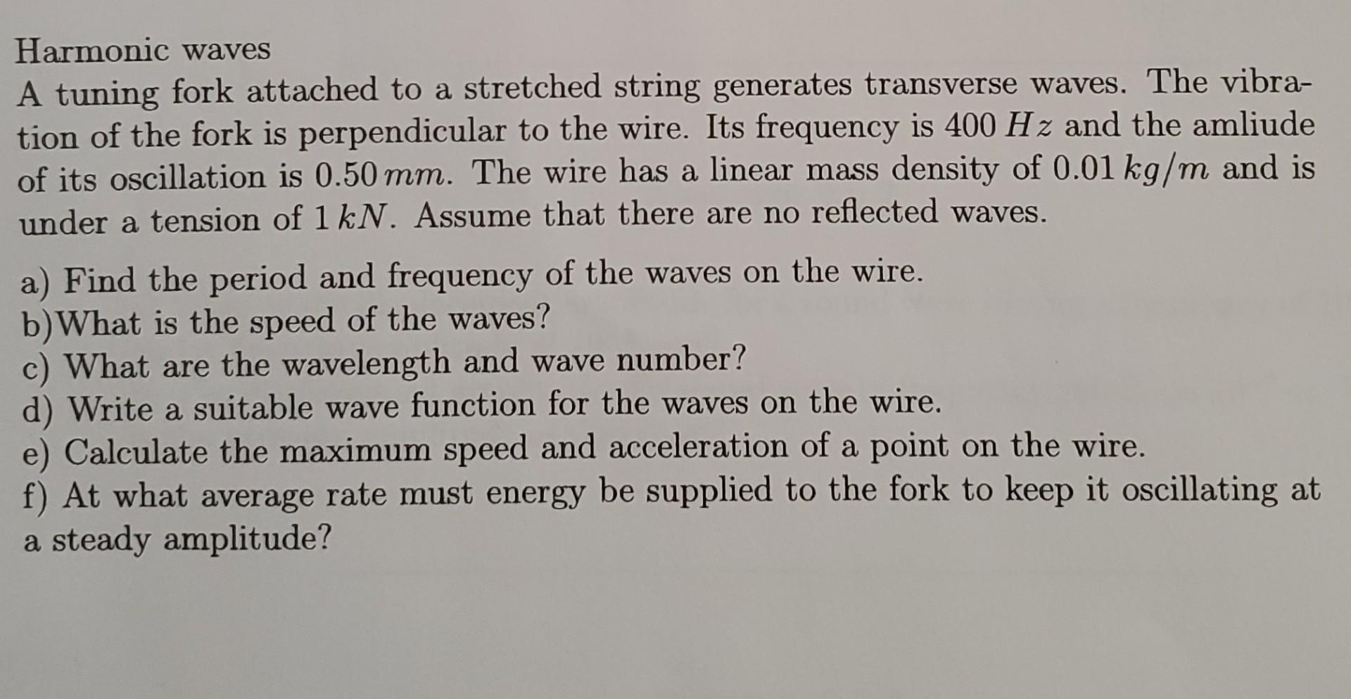 Solved Harmonic waves A tuning fork attached to a stretched | Chegg.com