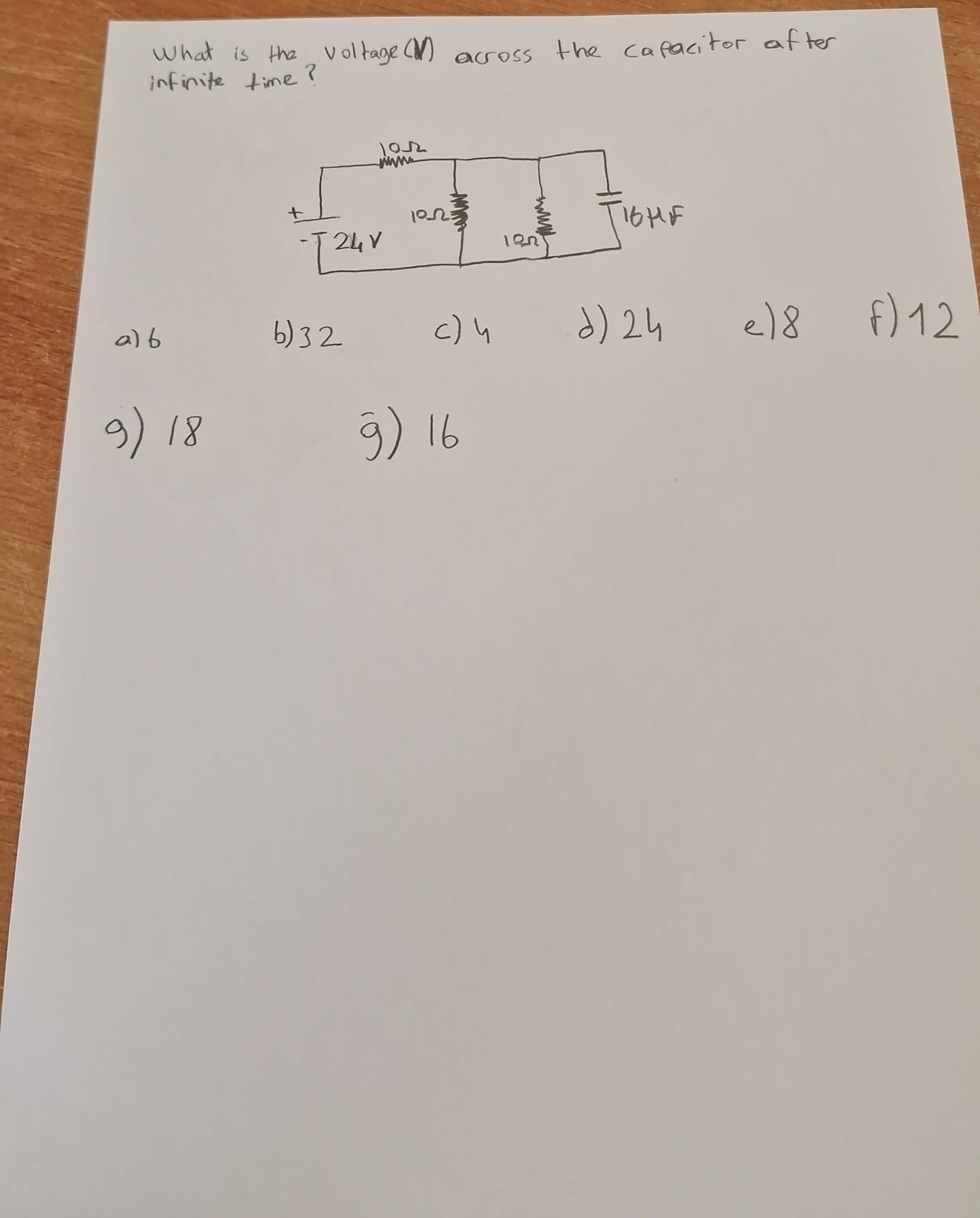 Solved What is the voltage (V) ﻿across the capacitor | Chegg.com