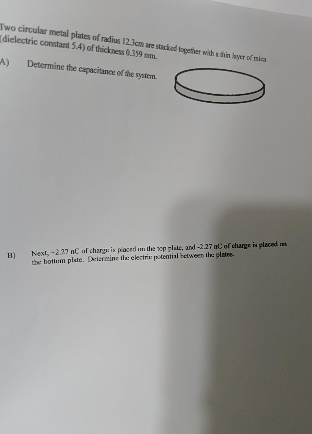 Solved Two circular metal plates of radius 12.3cm are | Chegg.com