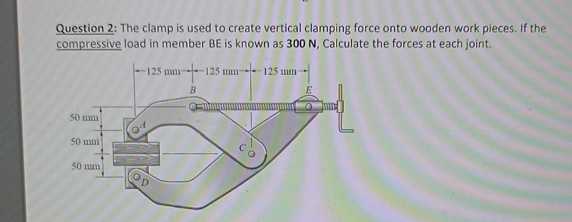 Solved Question 2: The clamp is used to create vertical | Chegg.com