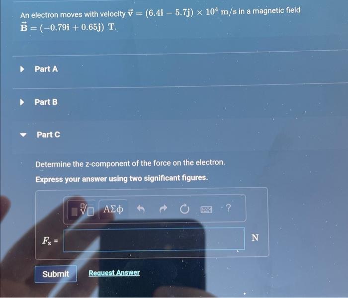 Solved An electron moves with velocity v=(6.4i−5.7j)×104 m/s | Chegg.com