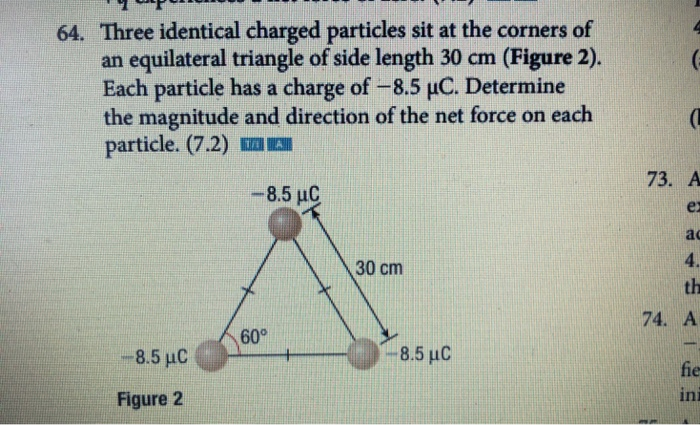 Solved 64. Three identical charged particles sit at the | Chegg.com