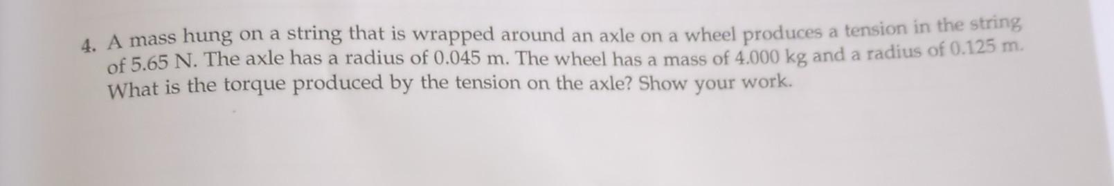 Solved A mass hung on a string that is wrapped around an | Chegg.com