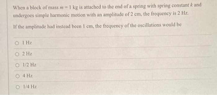 Solved When a block of mass m=1 kg is attached to the end of | Chegg.com