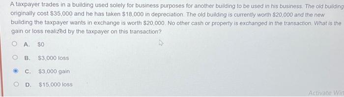 Solved A taxpayer trades in a building used solely for | Chegg.com