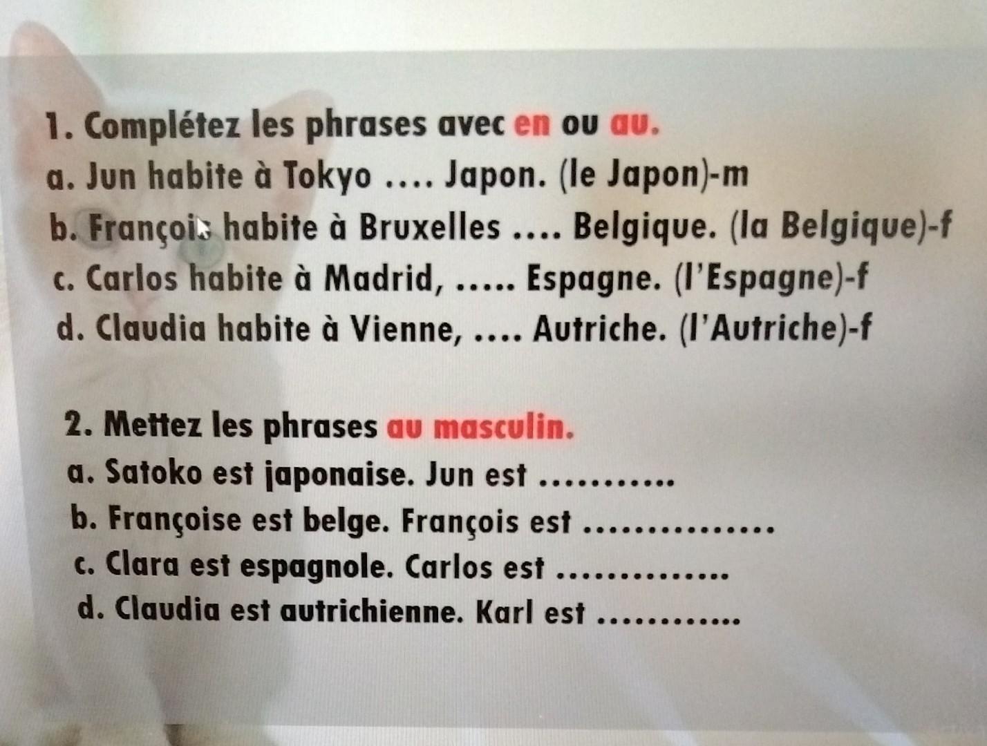 1. Complétez les phrases avec en ou au. a. Jun habite | Chegg.com