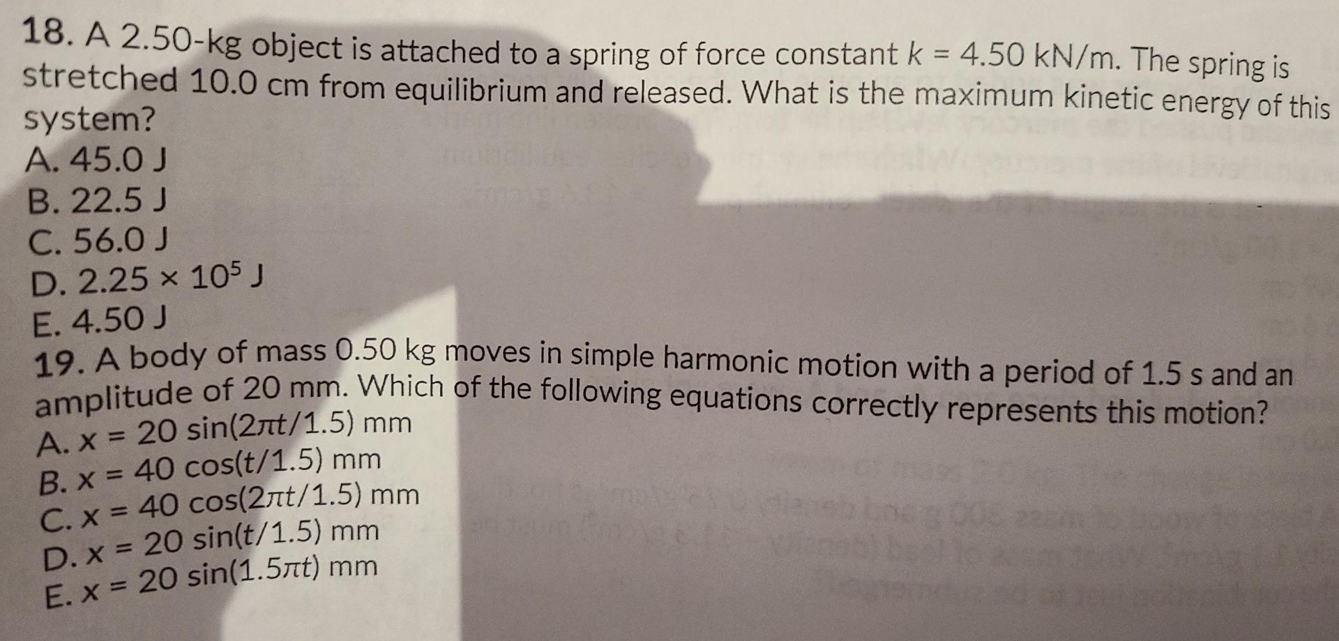Solved 18. A 2.50-kg object is attached to a spring of force | Chegg.com