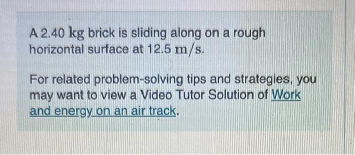 Solved A 2.40 kg brick is sliding along on a rough | Chegg.com