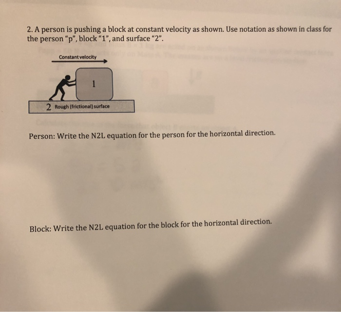 Solved 2. A person is pushing a block at constant velocity | Chegg.com