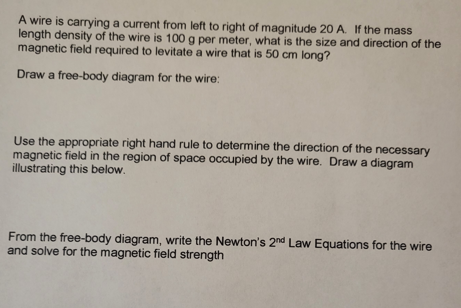 Solved A wire is carrying a current from left to right of | Chegg.com
