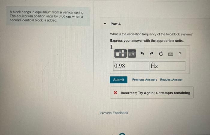 Solved A block hangs in equilibrium from a vertical spring. | Chegg.com