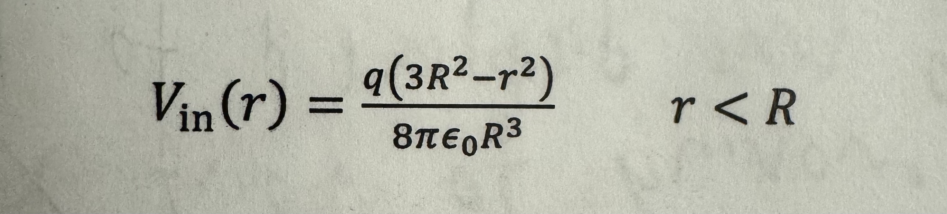 Solved A charge q is distributed uniformly throughout a | Chegg.com