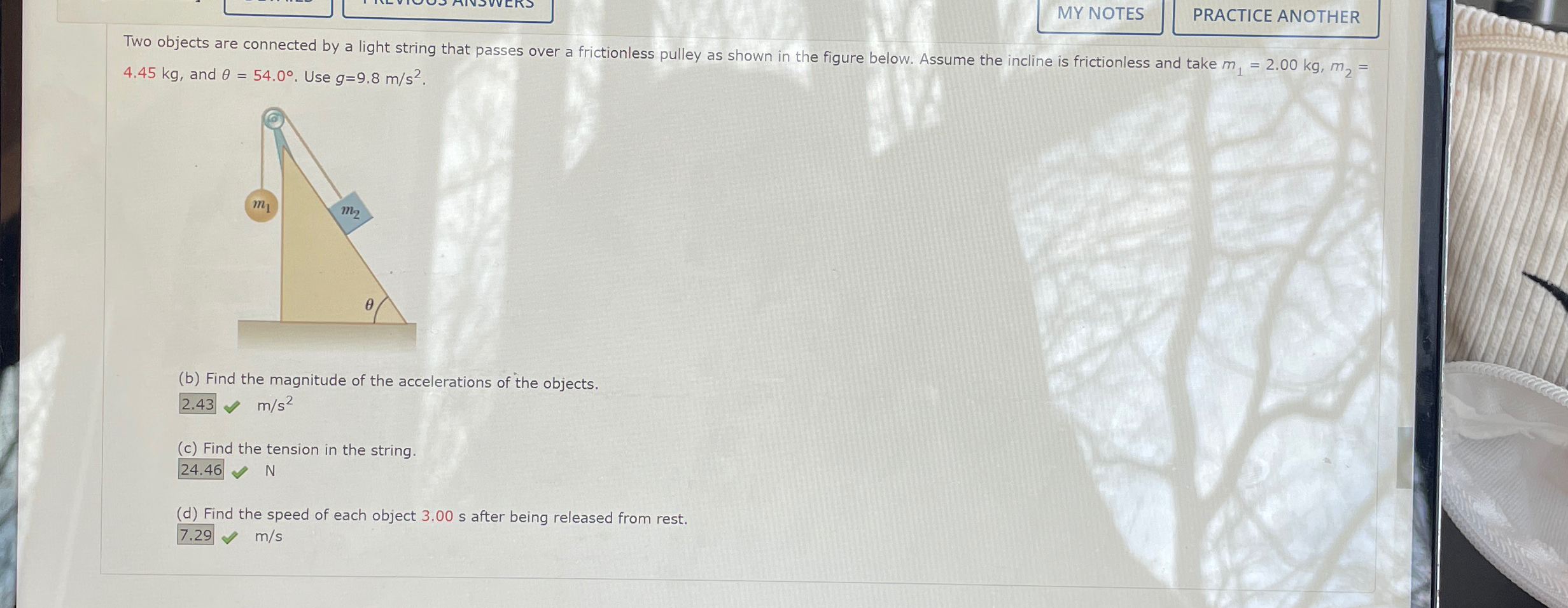 Solved Two objects are connected by a light string that | Chegg.com