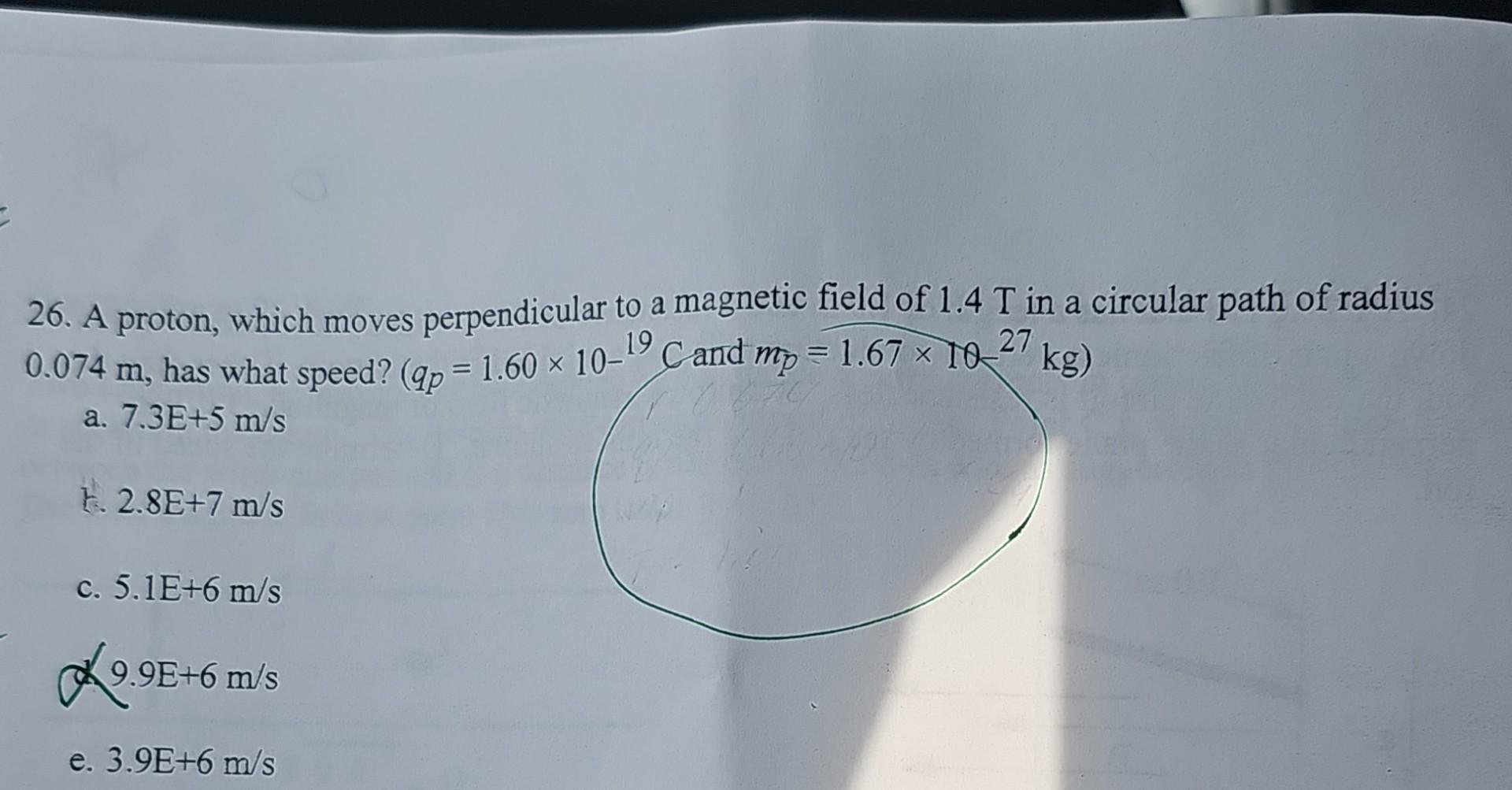 Solved 26. A proton, which moves perpendicular to a magnetic | Chegg.com
