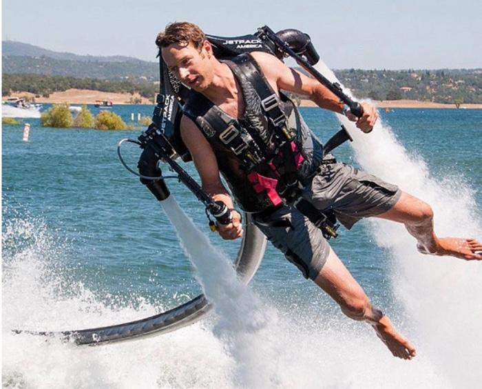 Solved The shown JetLevTM water-powered jetpack can propel | Chegg.com
