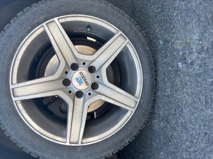 What is the brand name of these rims shown in | Chegg.com
