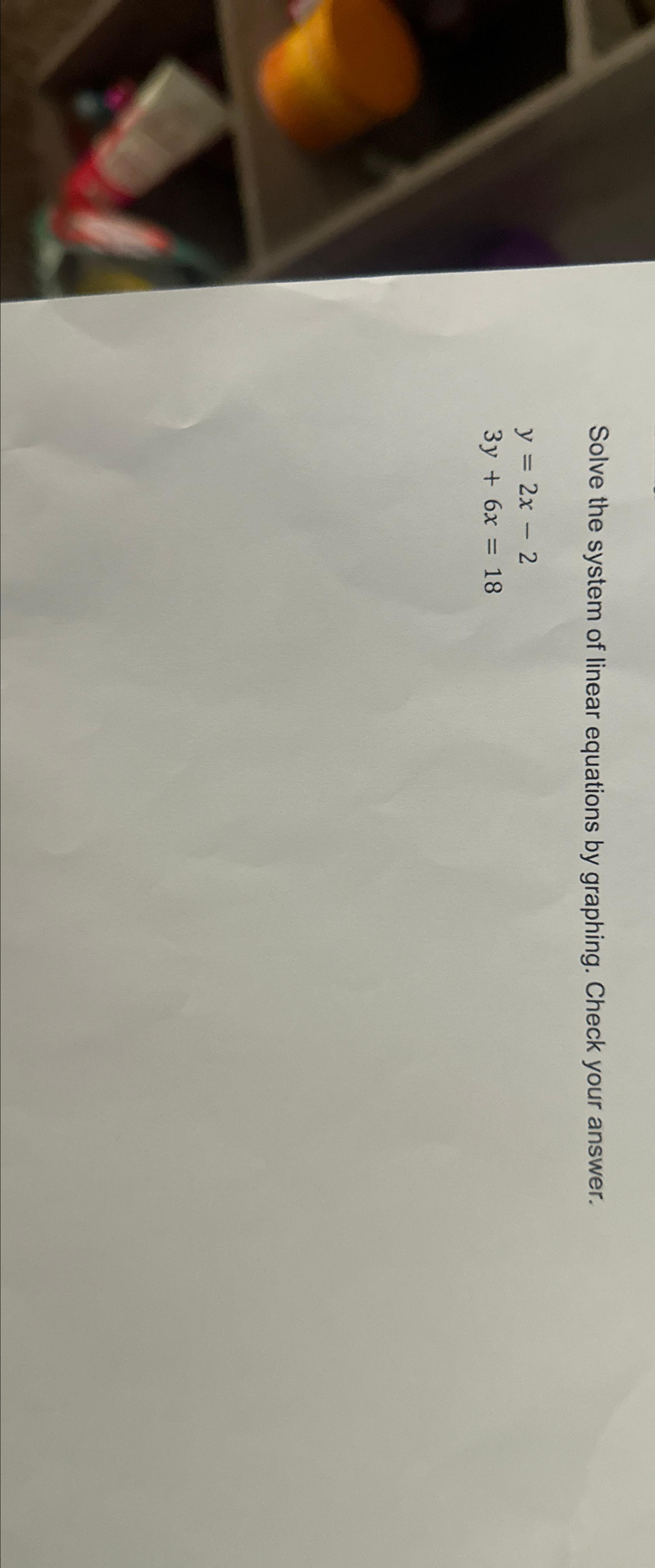 Solved Solve the system of linear equations by graphing. | Chegg.com