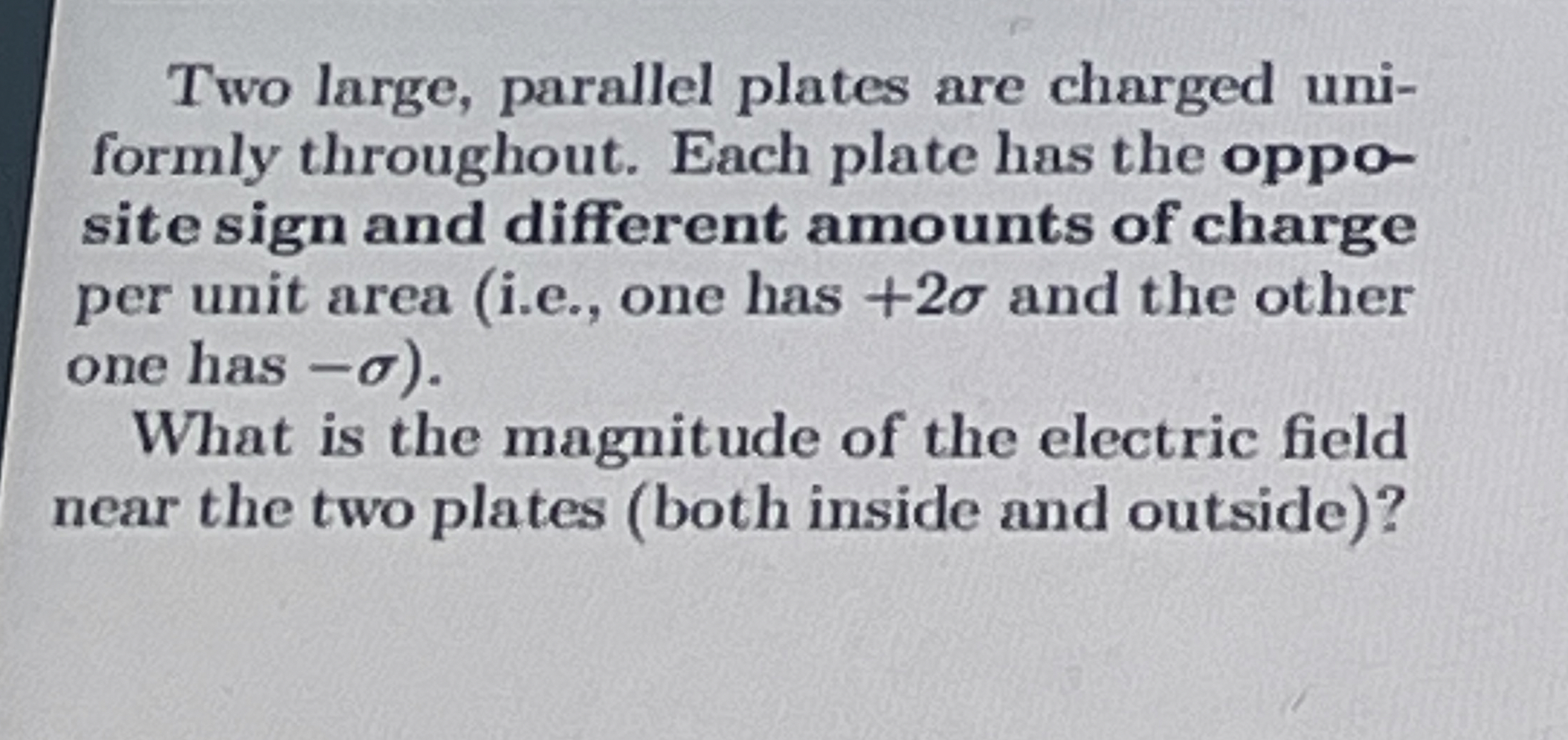 Solved Two large, parallel plates are charged uniformly | Chegg.com