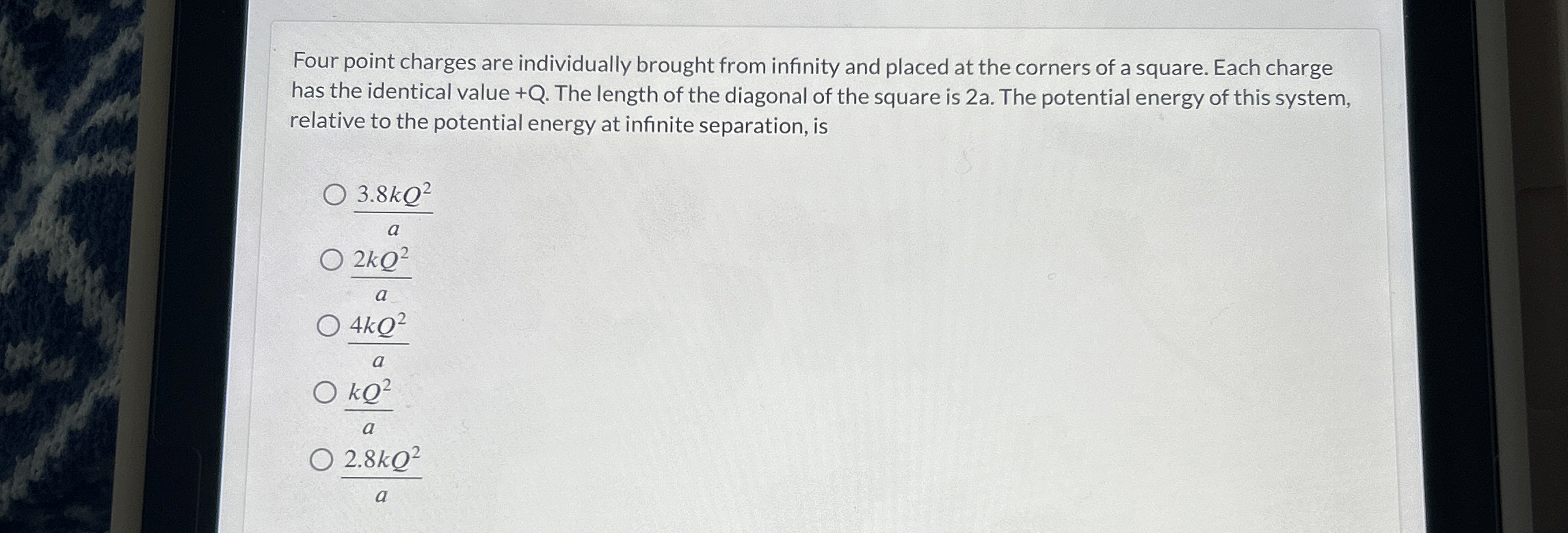 Solved Four point charges are individually brought from | Chegg.com