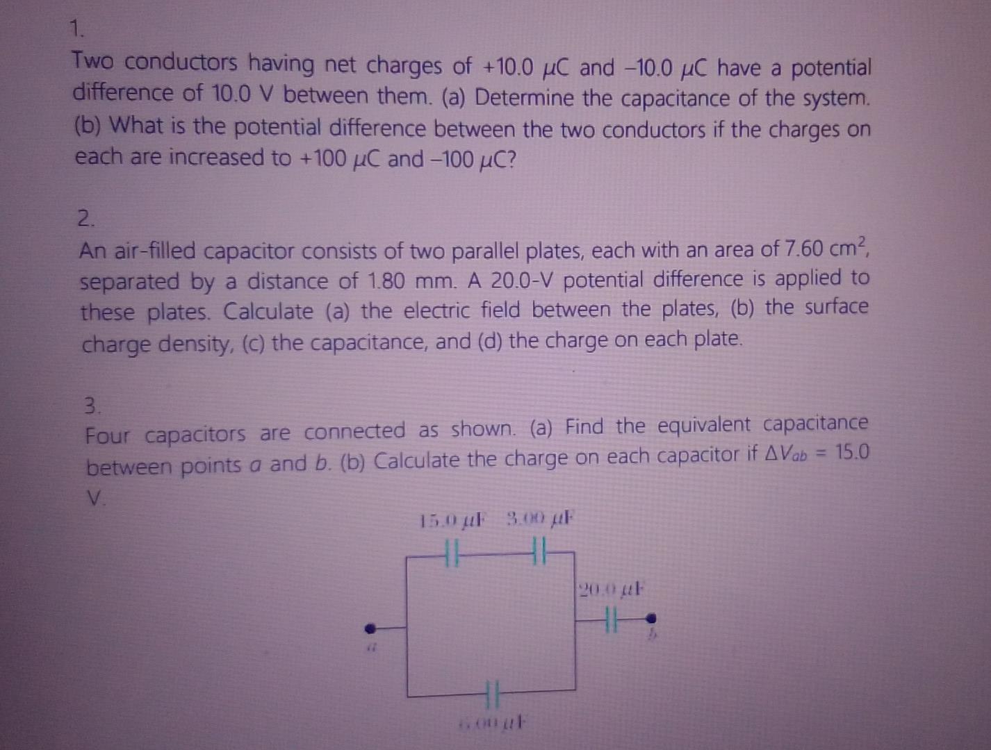 Solved Two conductors having net charges of +10.0μC and | Chegg.com