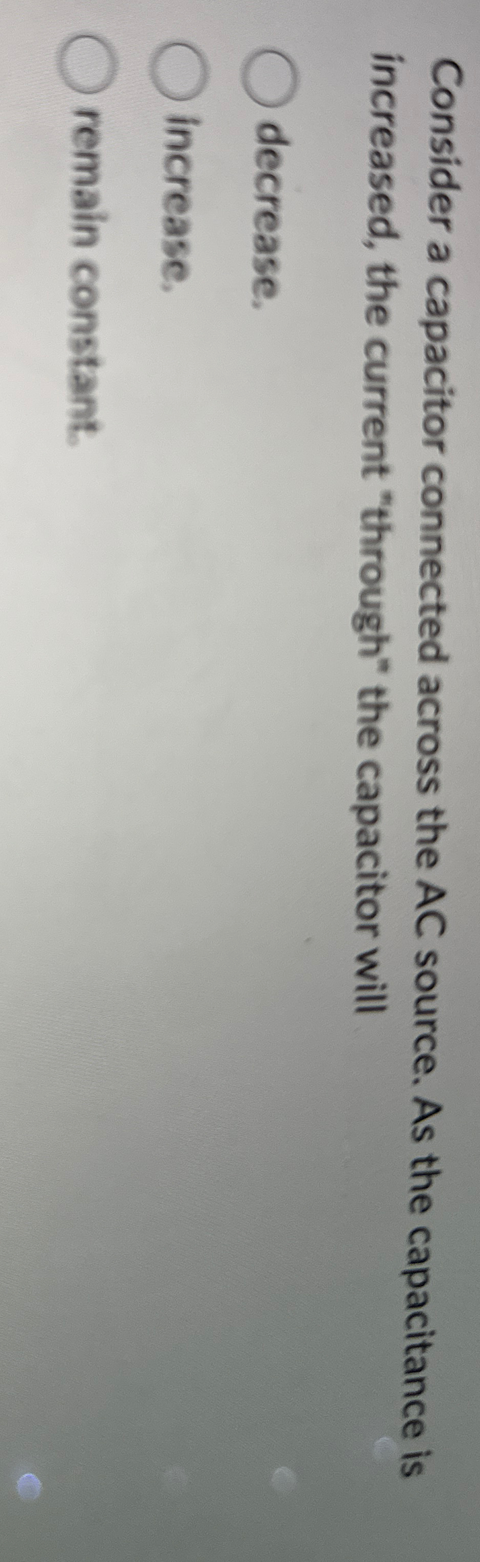 Solved Consider a capacitor connected across the AC source. | Chegg.com