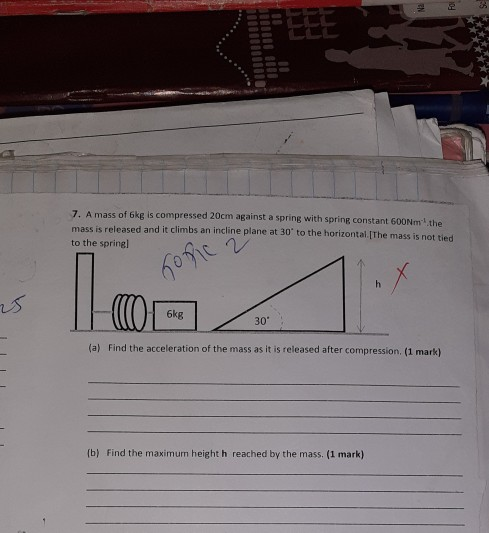Solved EEE 7. A mass of 6kg is compressed 20cm against a | Chegg.com
