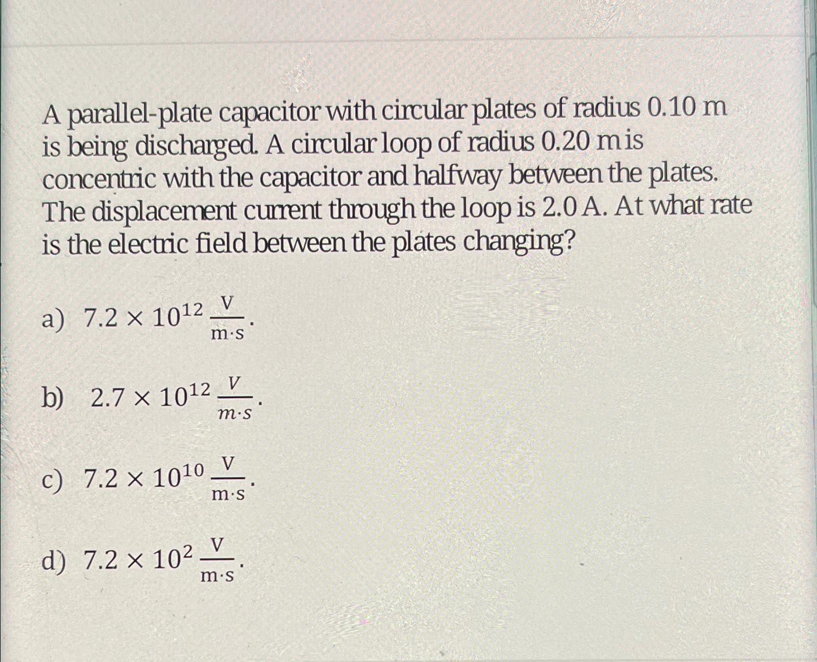 Solved A parallel-plate capacitor with circular plates of | Chegg.com