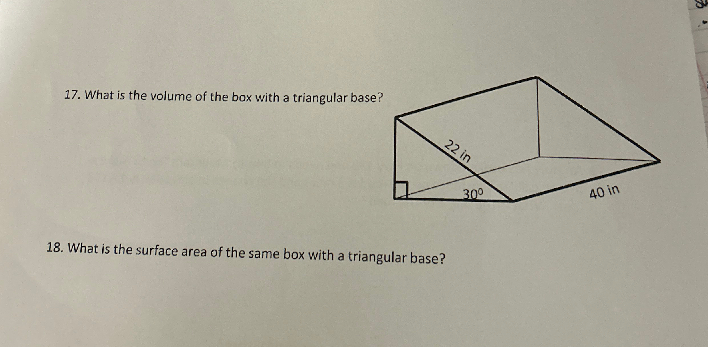 Solved What is the volume of the box with a triangular | Chegg.com