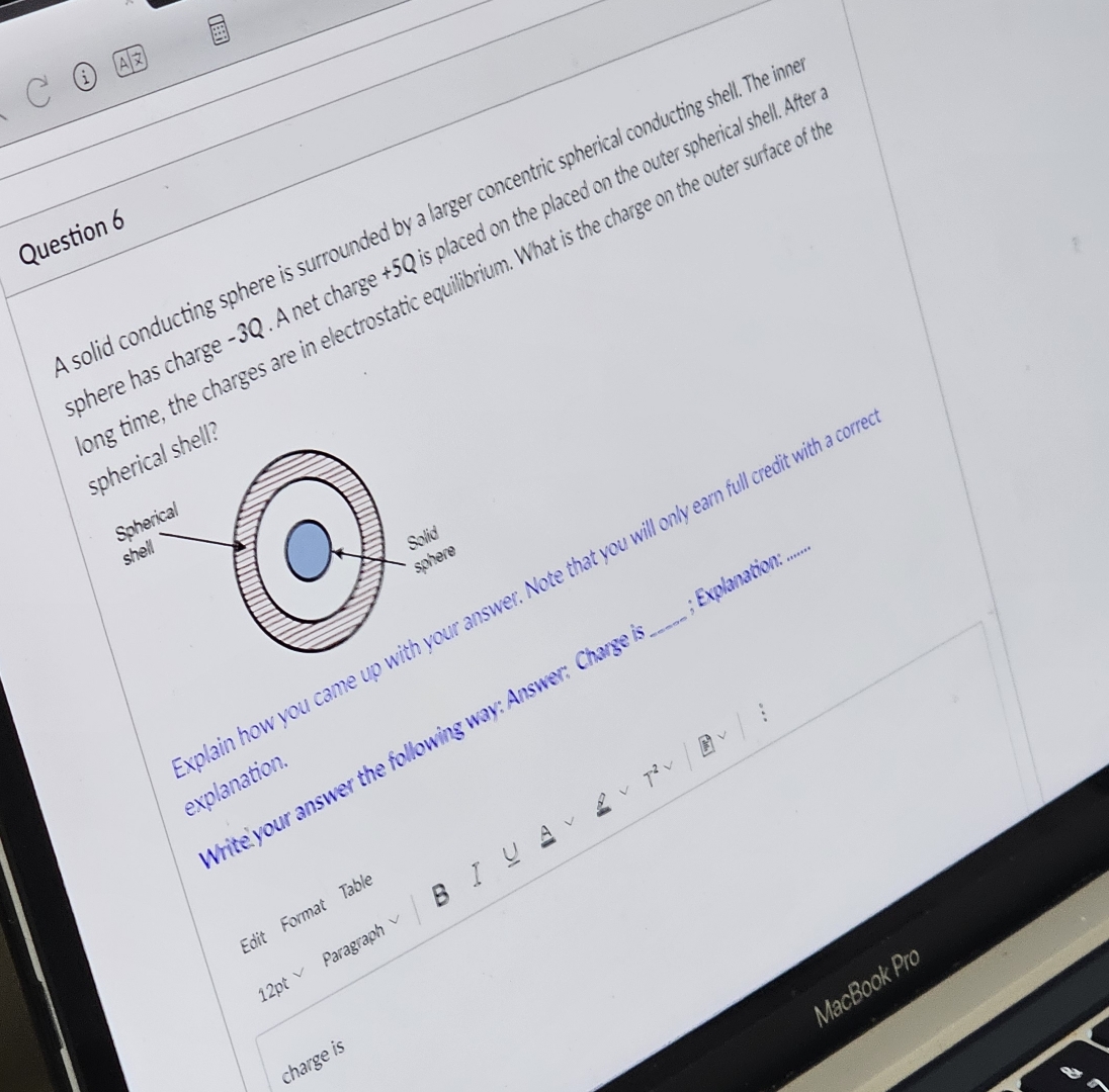 Solved Question 6A solid conducting sphere is surrounded by | Chegg.com
