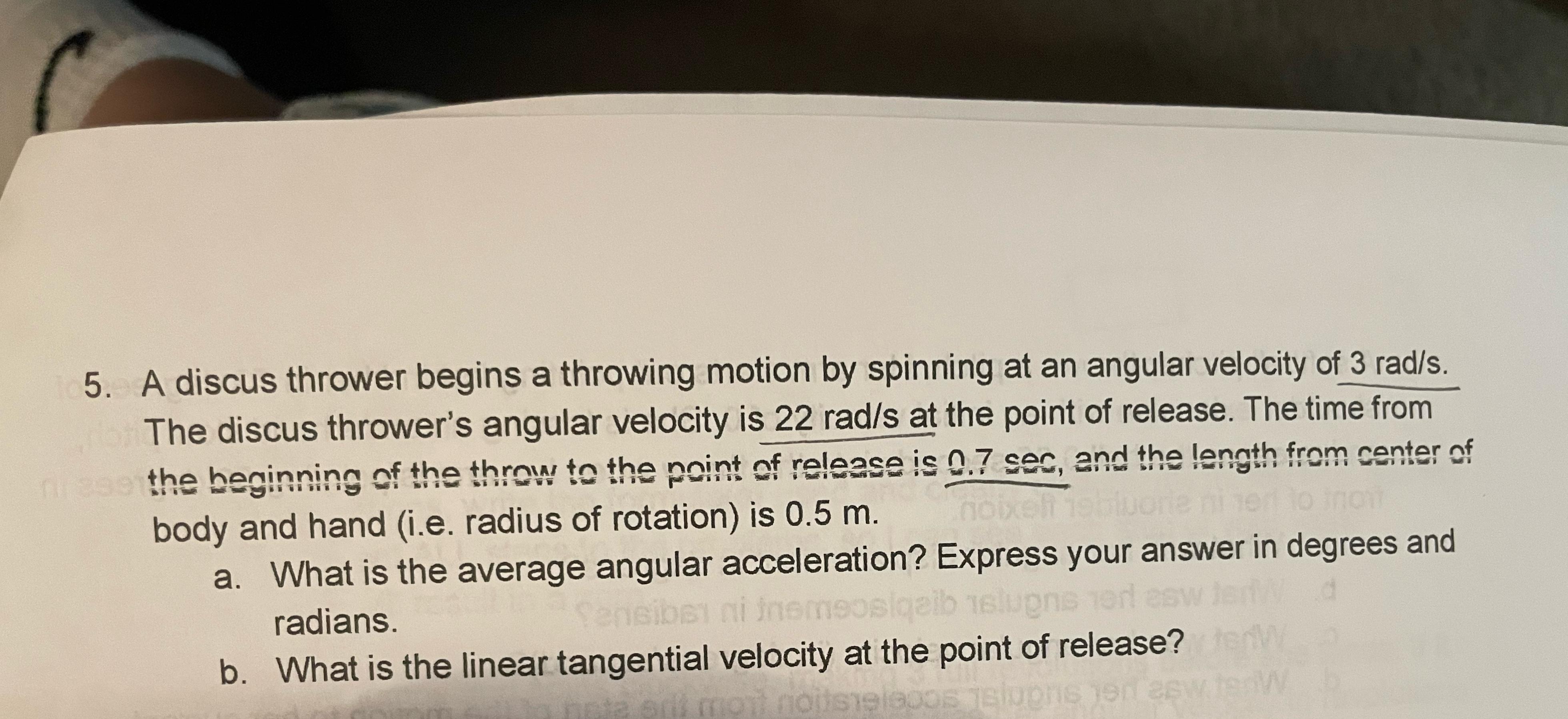 Solved A discus thrower begins a throwing motion by spinning | Chegg.com