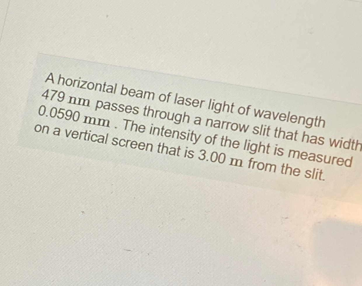 Solved A horizontal beam of laser light of wavelength 479nm | Chegg.com