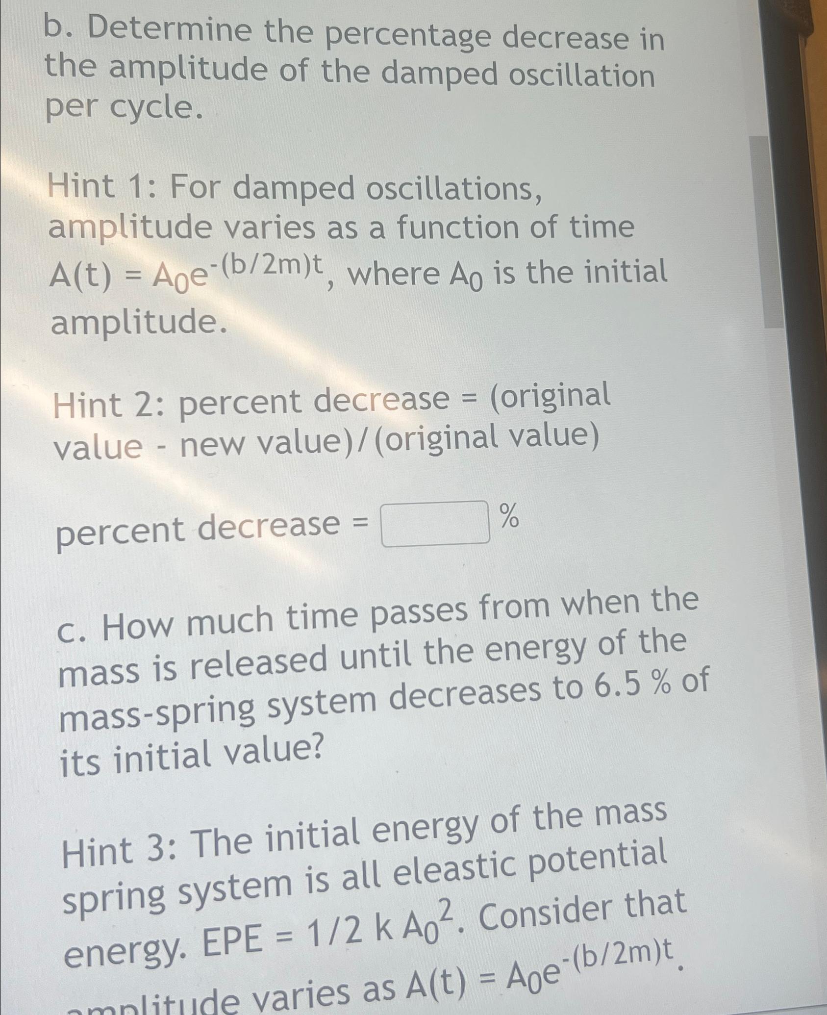 Solved b. Determine the percentage decrease in the amplitude | Chegg.com