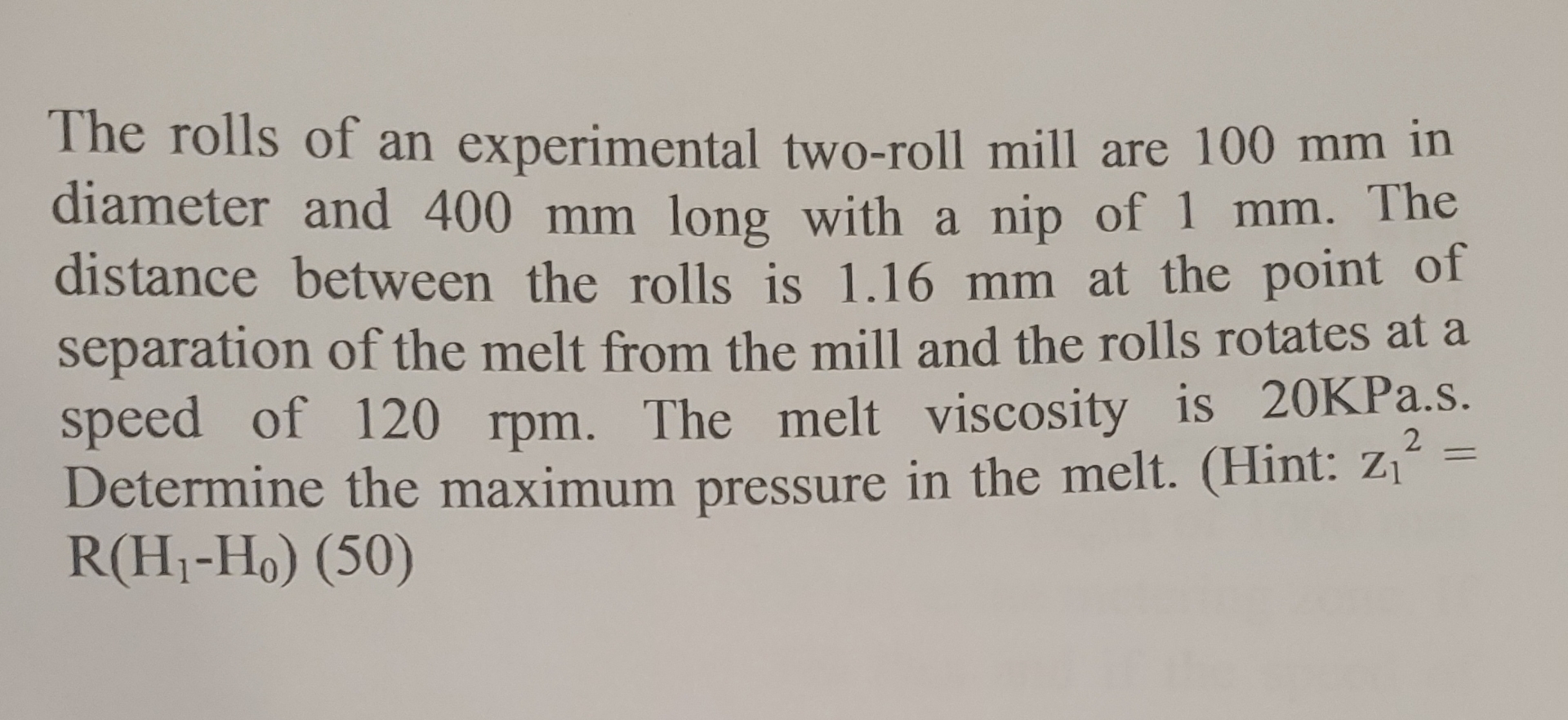 Solved The rolls of an experimental two-roll mill are 100mm | Chegg.com