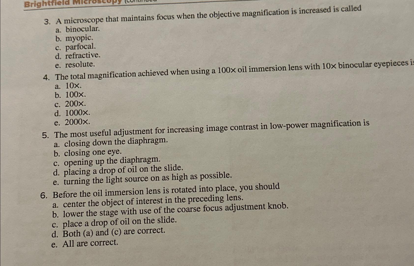 Solved A microscope that maintains focus when the objective | Chegg.com