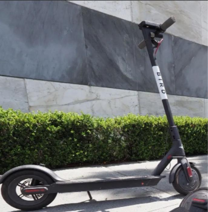 Solved scooter leaning against the wall with one handle,1, | Chegg.com