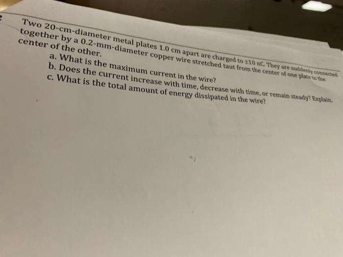 Solved Two 20-cm-diameter metal plates 1.0 cm apart are | Chegg.com