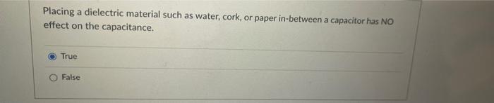 Solved Placing a dielectric material such as water, cork, or | Chegg.com