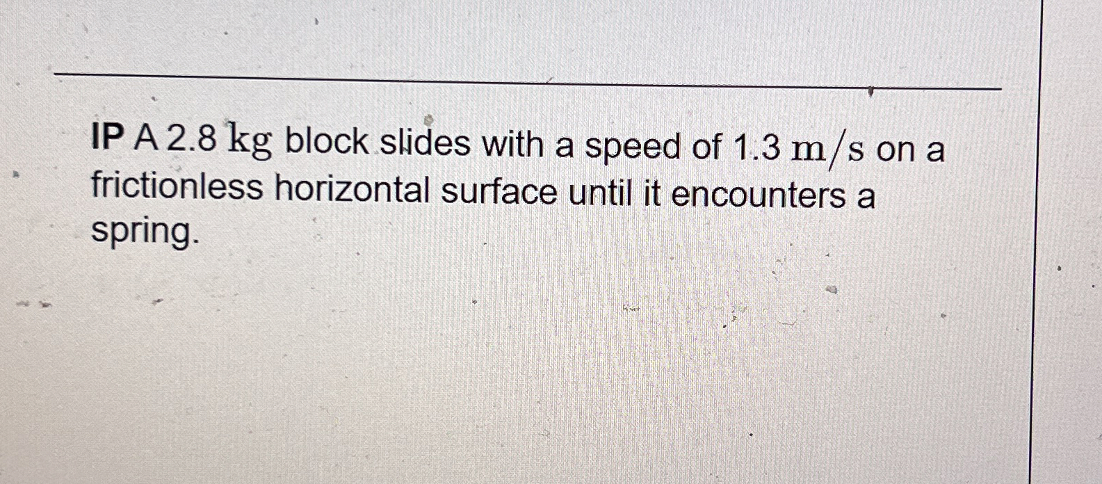 Solved IP A 2.8 ﻿kg block slides with a speed of 1.3ms ﻿on | Chegg.com