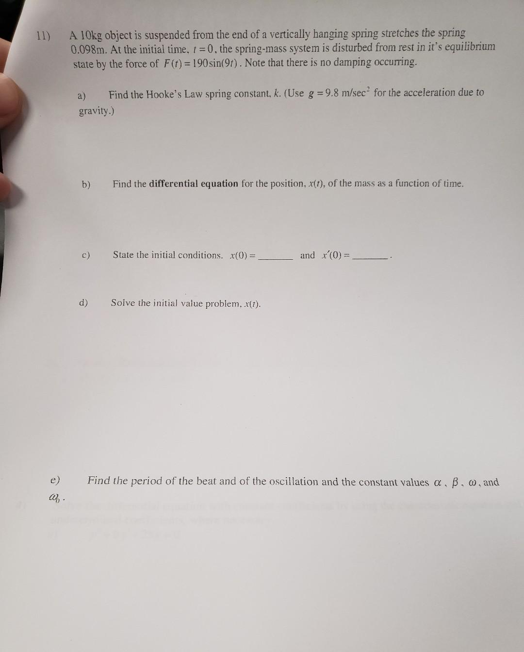 Solved A 10 kg object is suspended from the end of a | Chegg.com