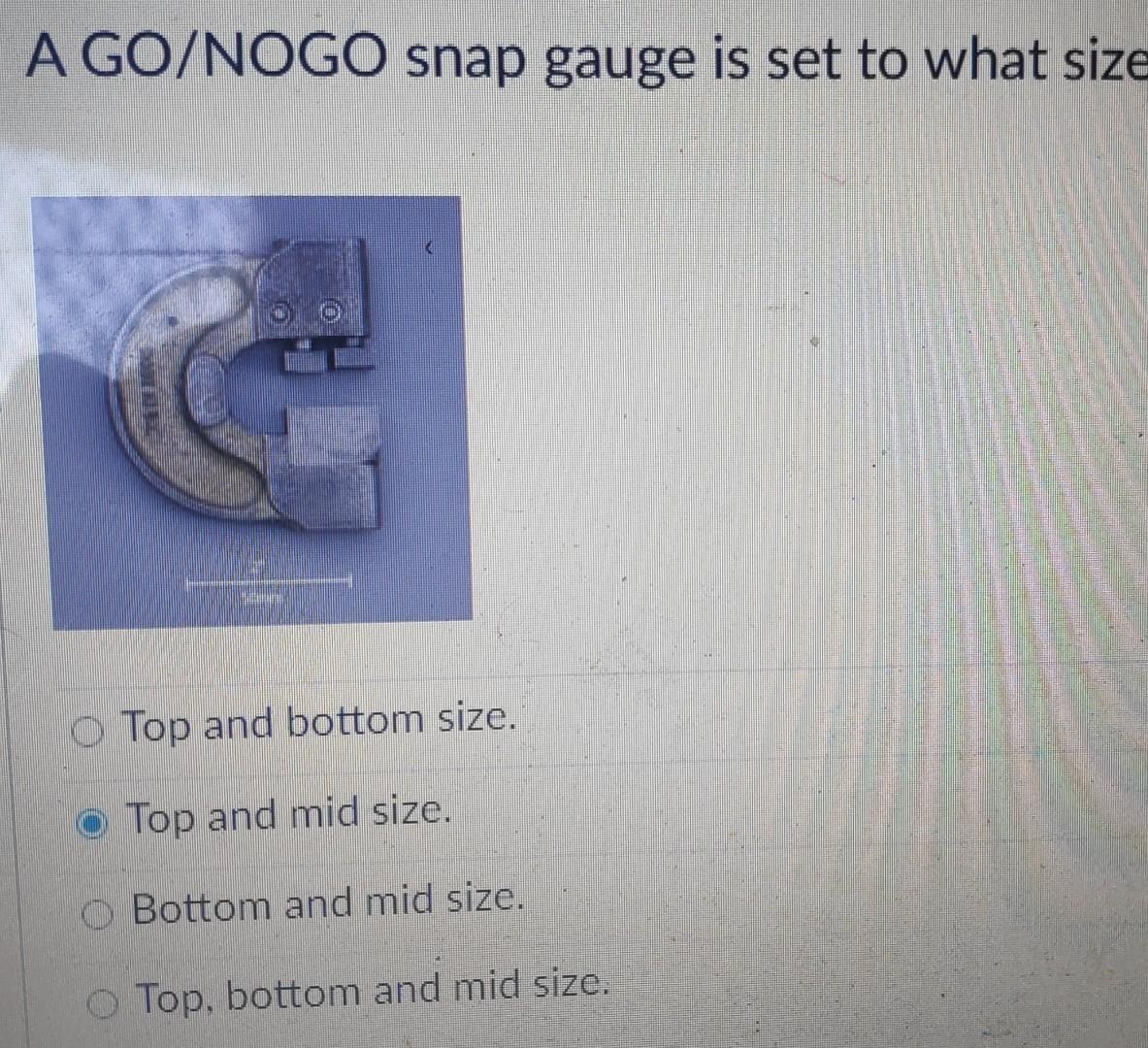 Solved A GO/NOGO snap gauge is set to what size Top and | Chegg.com