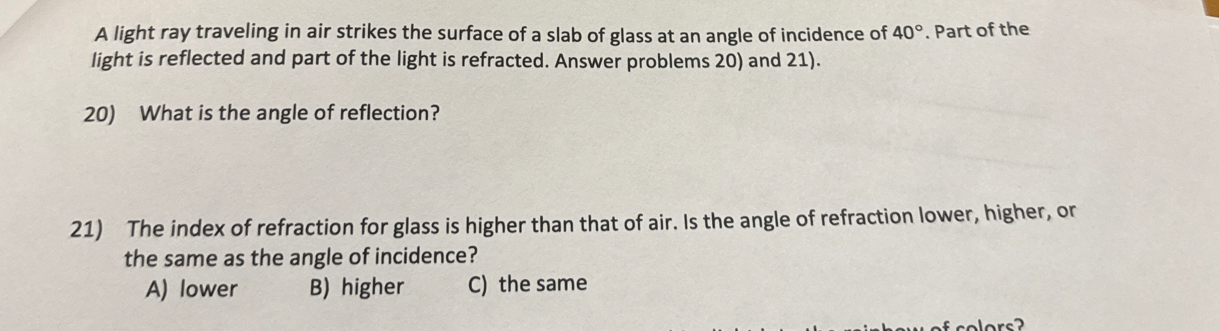 Solved A light ray traveling in air strikes the surface of a | Chegg.com