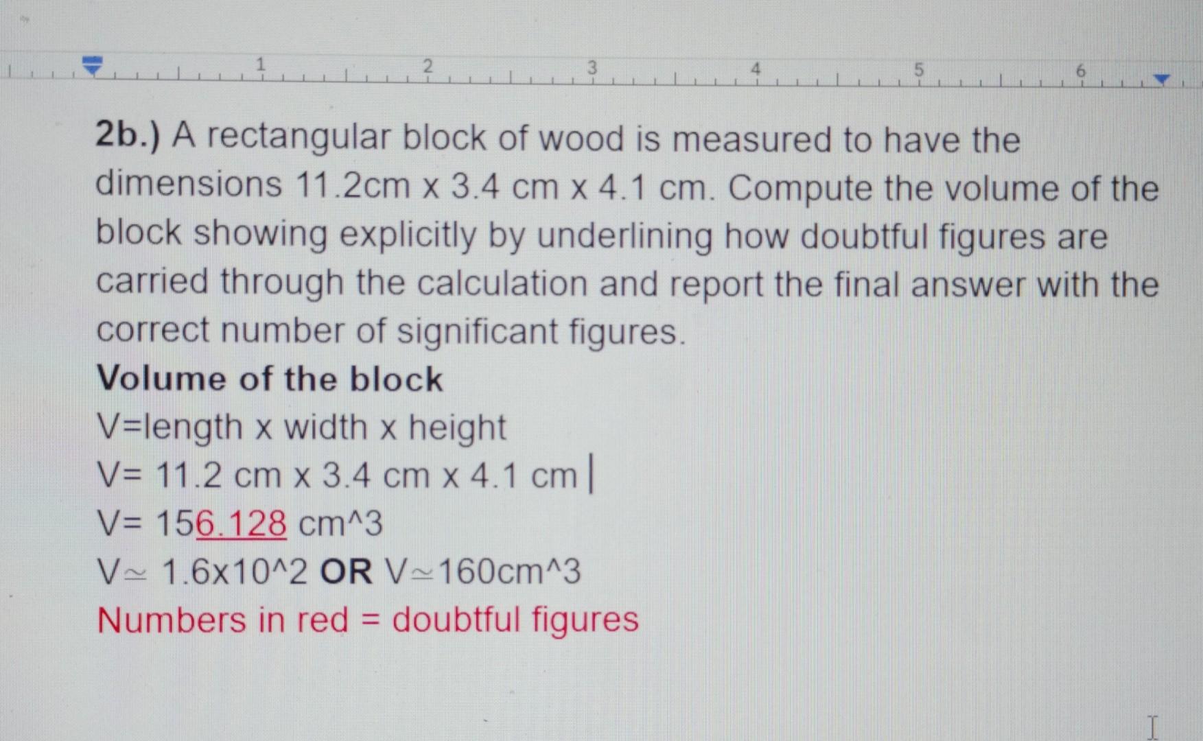 Solved A rectangular block of wood is measured to have the | Chegg.com
