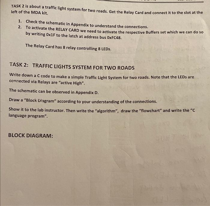 Solved TASK 2 is about a traffic light system for two roads. | Chegg.com