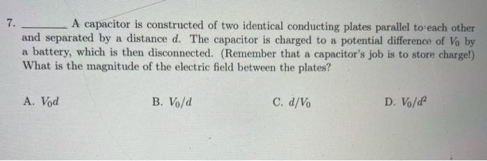 Solved 7. A capacitor is constructed of two identical | Chegg.com