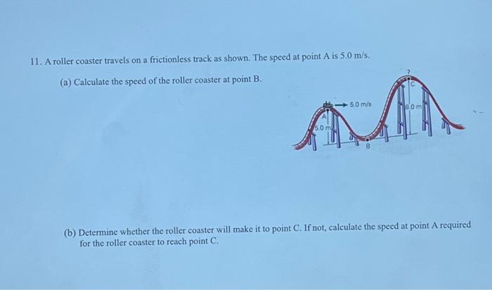 Solved 11. A roller coaster travels on a frictionless track | Chegg.com