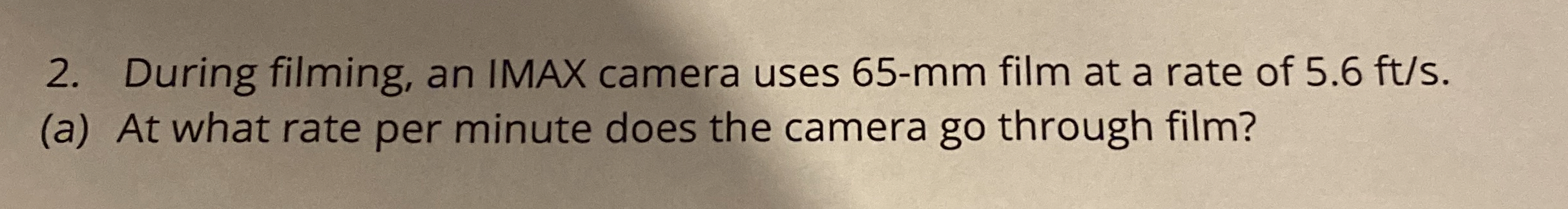 Solved During filming, an IMAX camera uses 65-mm ﻿film at a | Chegg.com