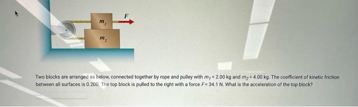 Solved Two blocks are arranged as below, connected together | Chegg.com