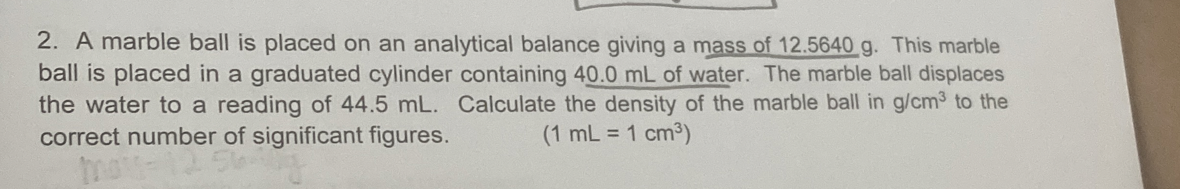 A marble ball is placed on an analytical balance | Chegg.com