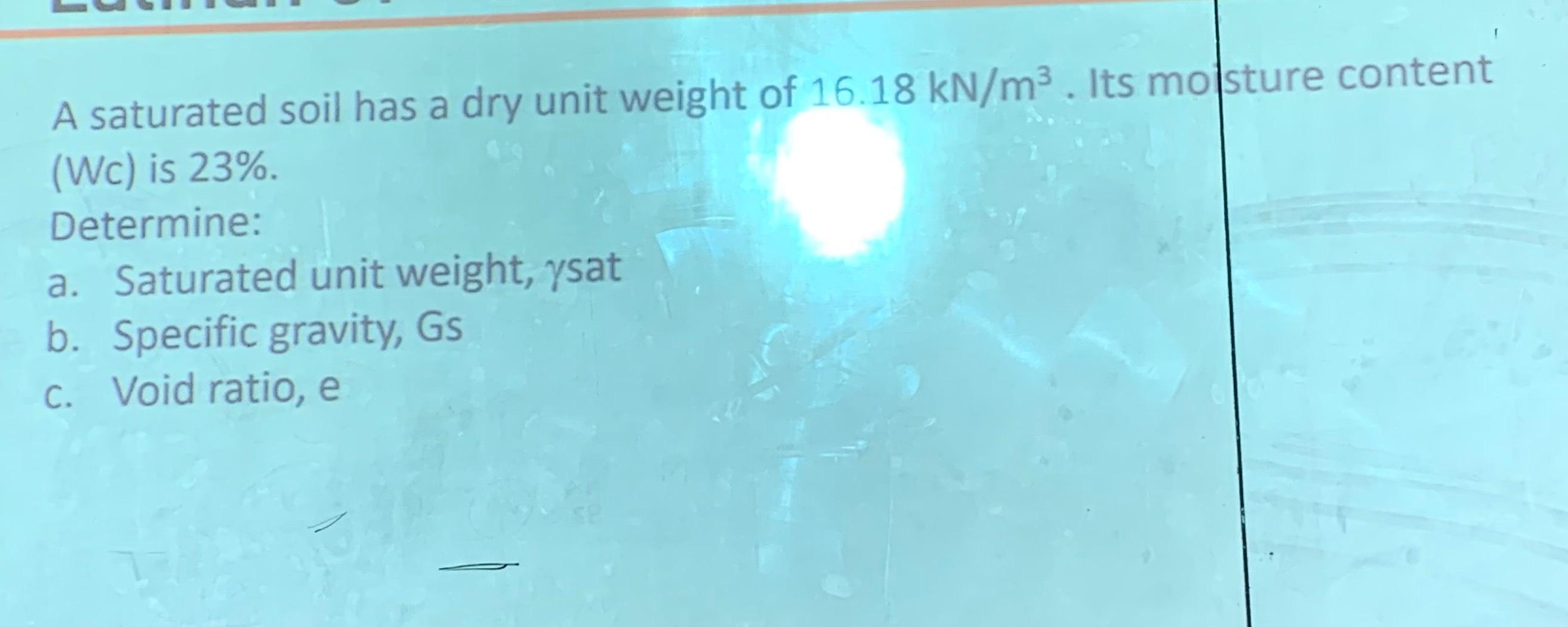 Solved A saturated soil has a dry unit weight of 16.18kNm3. | Chegg.com