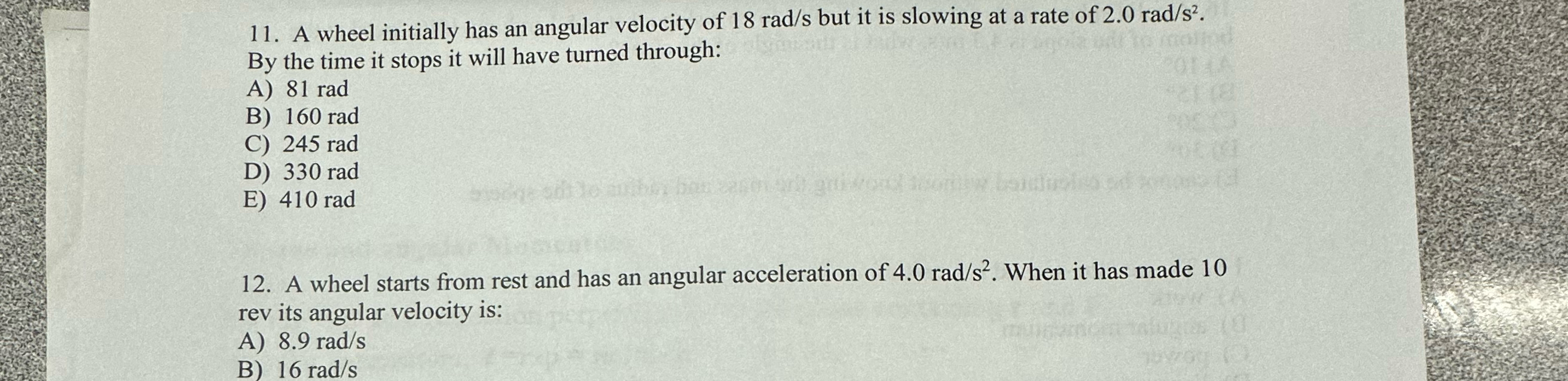 Solved A wheel initially has an angular velocity of 18rads | Chegg.com